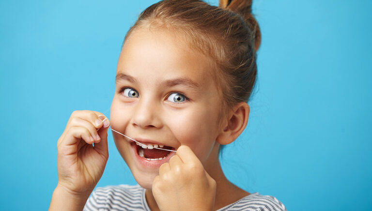 When Should My Child Start Flossing? - Sweet Tooth Kids Dentistry